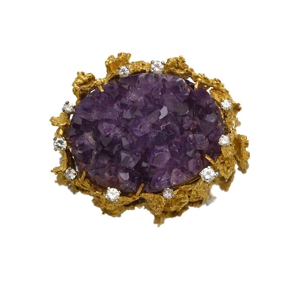 Bonhams : An amethyst crystal aggregate, diamond and 18K gold brooch