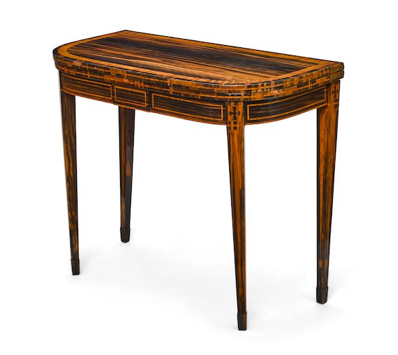 Bonhams : A George III satinwood inlaid coromandel fold top games table ...