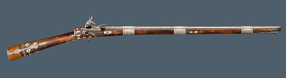 Bonhams : A silver-mounted Caucasian miquelet rifle