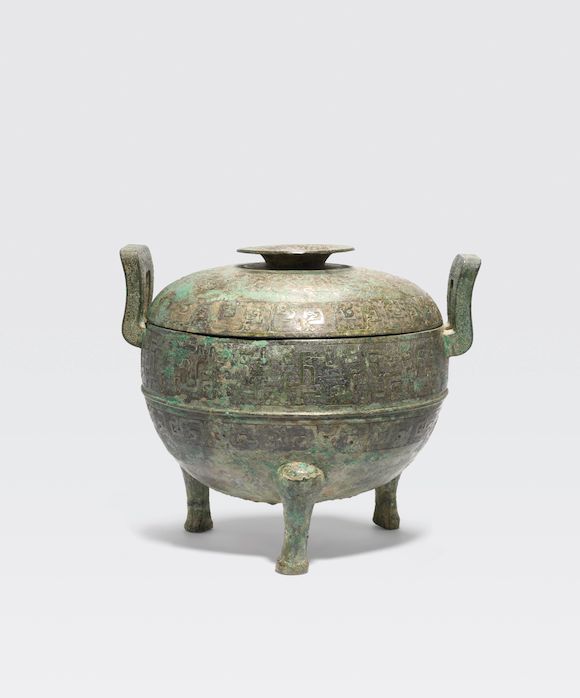 Bonhams : A cast bronze ceremonial tripod and cover, ding Eastern Zhou ...