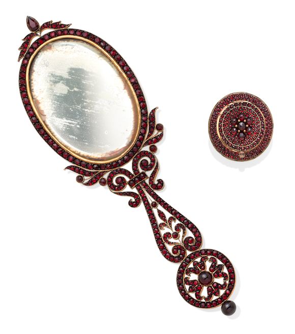 Bonhams : A late 19th century garnet and silver-gilt hand held mirror ...