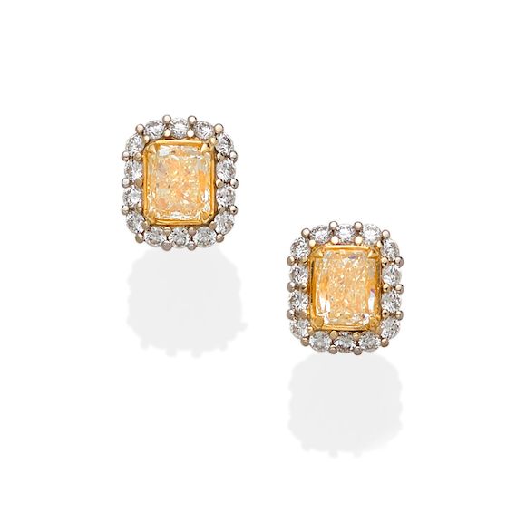 Bonhams : A pair of colored diamond, diamond and 18k bi-color gold earrings