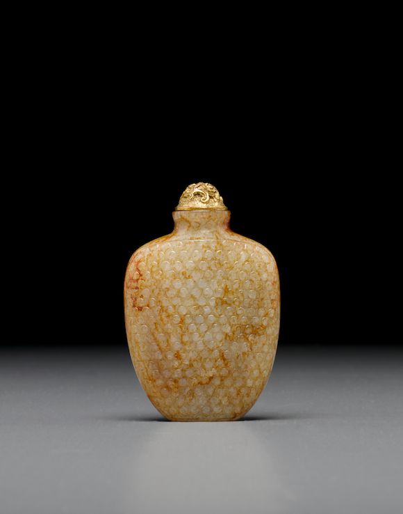 Bonhams : A well-hollowed shield-form russet jade snuff bottle 1750-1850