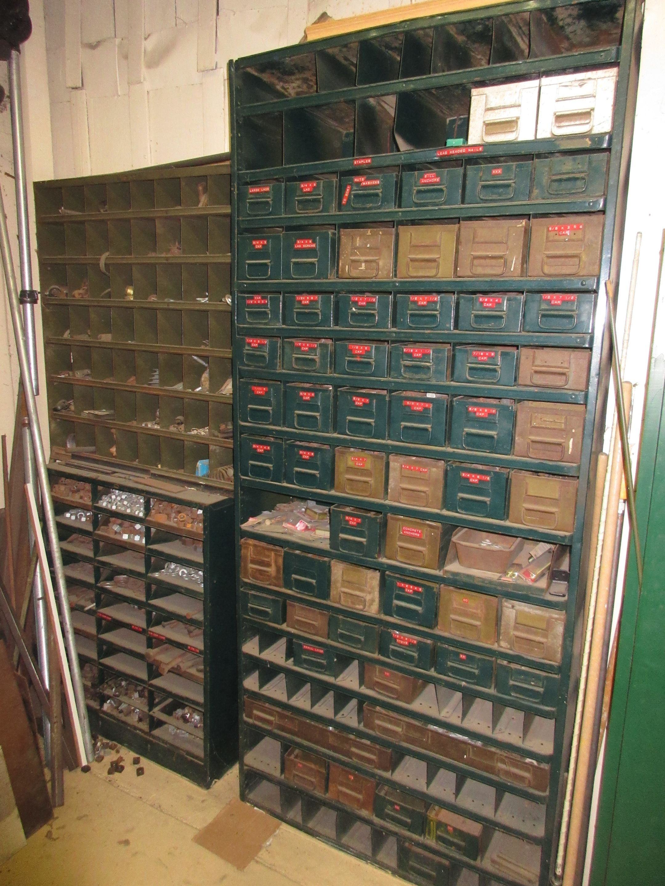 Bonhams Cars : Assorted hardware drawers and racks,