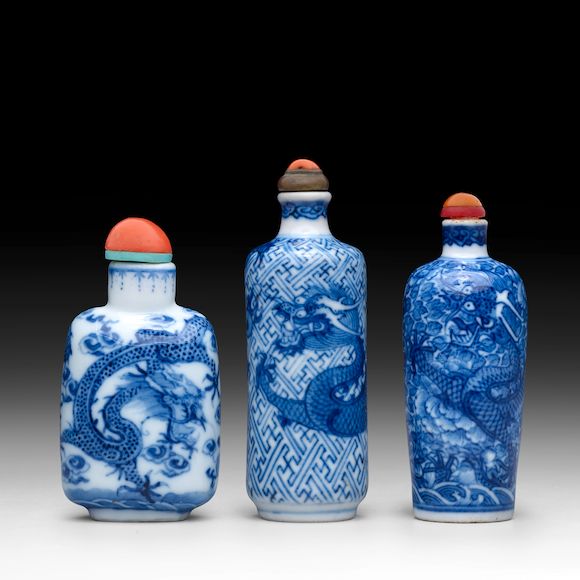 Bonhams : THREE BLUE AND WHITE PORCELAIN 'DRAGON' SNUFF BOTTLES 19th century