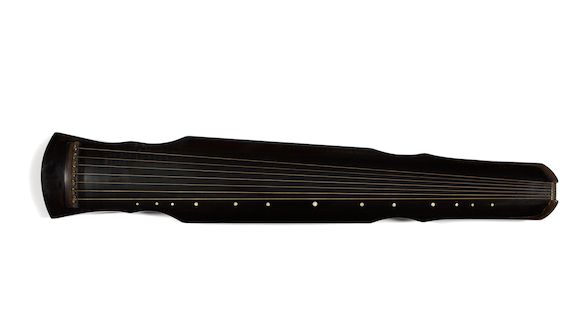 Bonhams : A lacquered qin (zither) with seven strings