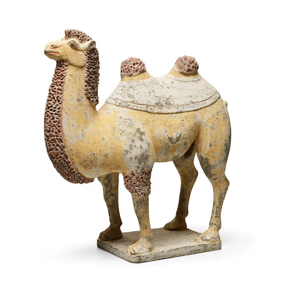 Bonhams : A PAINTED GRAY POTTERY FIGURE OF A BACTRIAN CAMEL Northern Qi ...