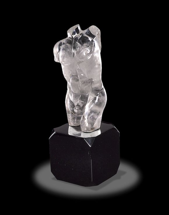 Bonhams : Rock Crystal Carving of a Male Torso on an Obsidian Base