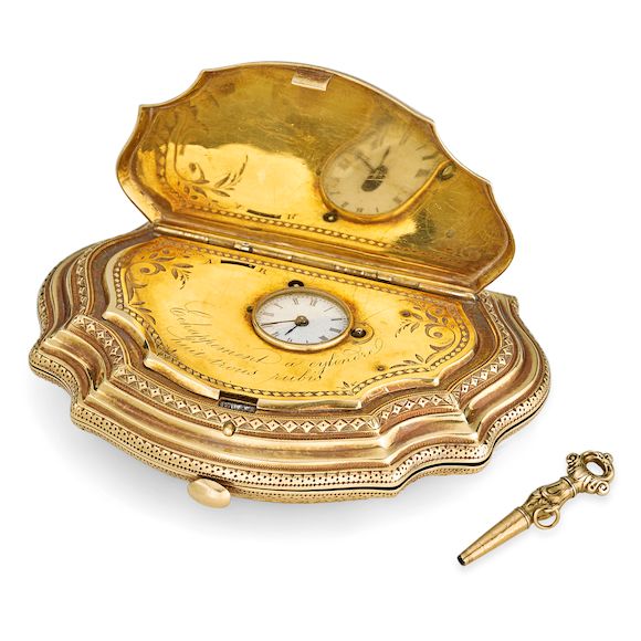 Bonhams : A fine Swiss engraved gold coin purse with concealed watch ...