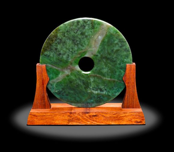 Bonhams : Big Nephrite Bi Disc on Wooden Stand