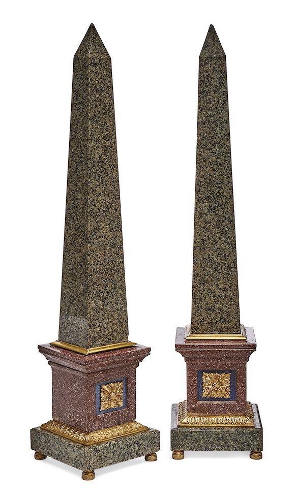 Bonhams : A pair of Neoclassical style gilt bronze mounted granite obelisks