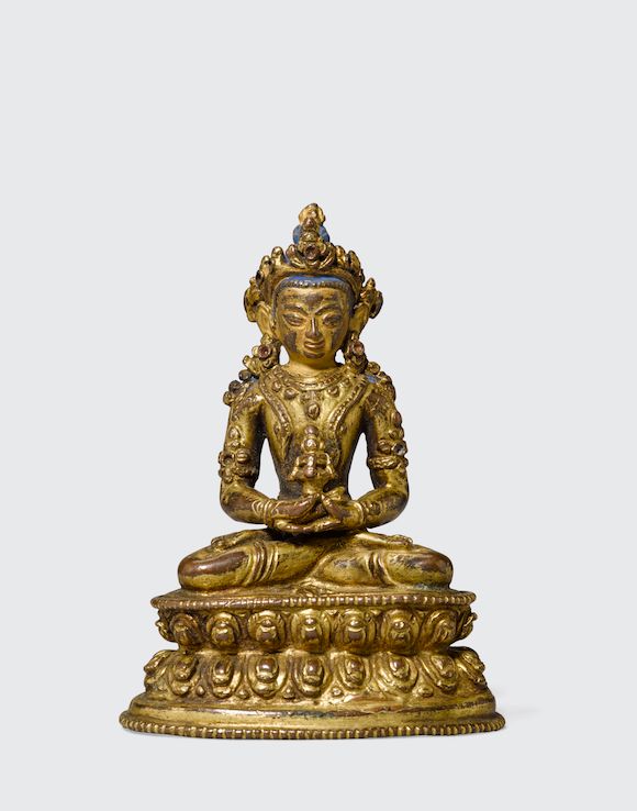 Bonhams : A GILT COPPER ALLOY FIGURE OF AMITAYUS Nepal, circa 14th century