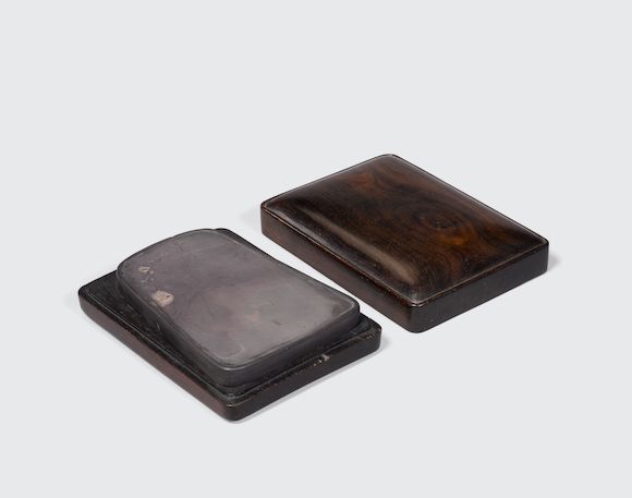 Bonhams : A duan ink stone and hardwood box Qing dynasty