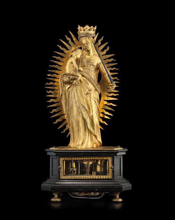 Bonhams : A fine gilt brass and ebony Madonna and Child figural clock ...
