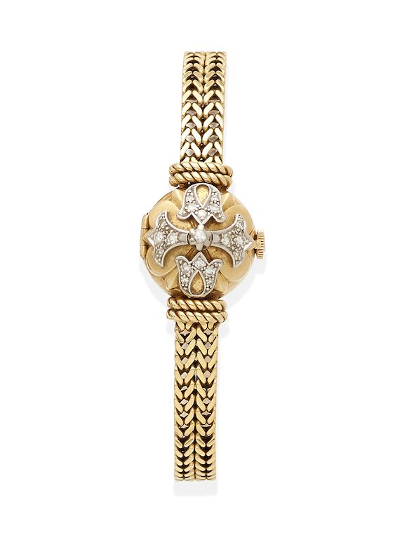 Bonhams : A diamond and 18k gold concealed dial bracelet wristwatch, Rolex