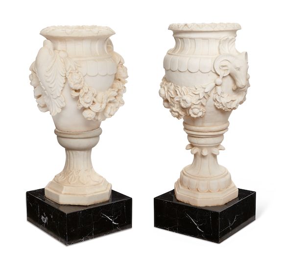 Bonhams : Two Neoclassical style carved white marble garden urns on ...