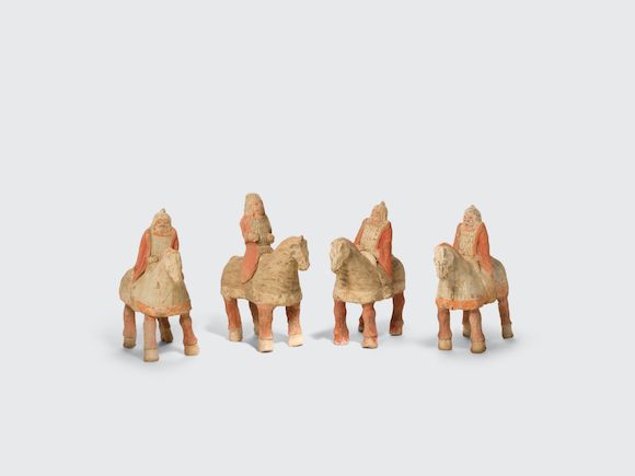 Bonhams : A GROUP OF FOUR PAINTED POTTERY WARRIORS ON ARMORED HORSES ...