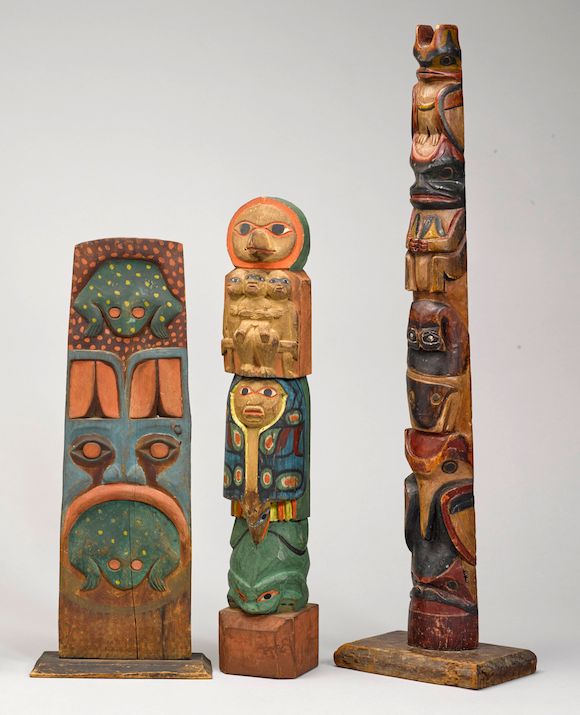 Bonhams : Three model totem poles