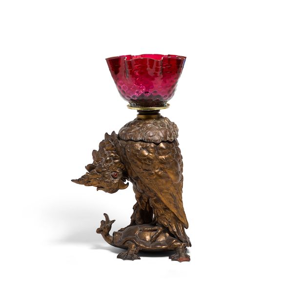 Bonhams : An American gilt metal cockatiel and turtle form oil lamp ...