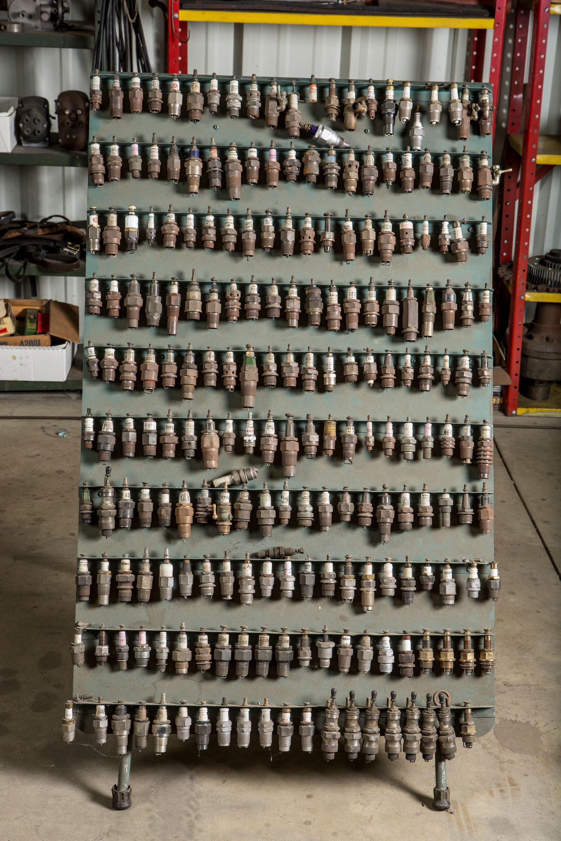 Bonhams Cars : A GOOD DISPLAY OF SPARK PLUGS,