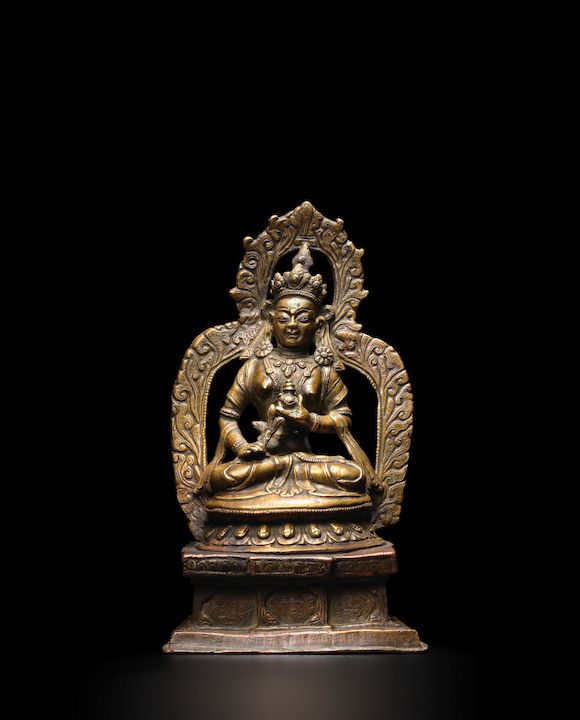 Bonhams : A COPPER ALLOY FIGURE OF SHERAP CHAMMA TIBET, 15TH/16TH CENTURY