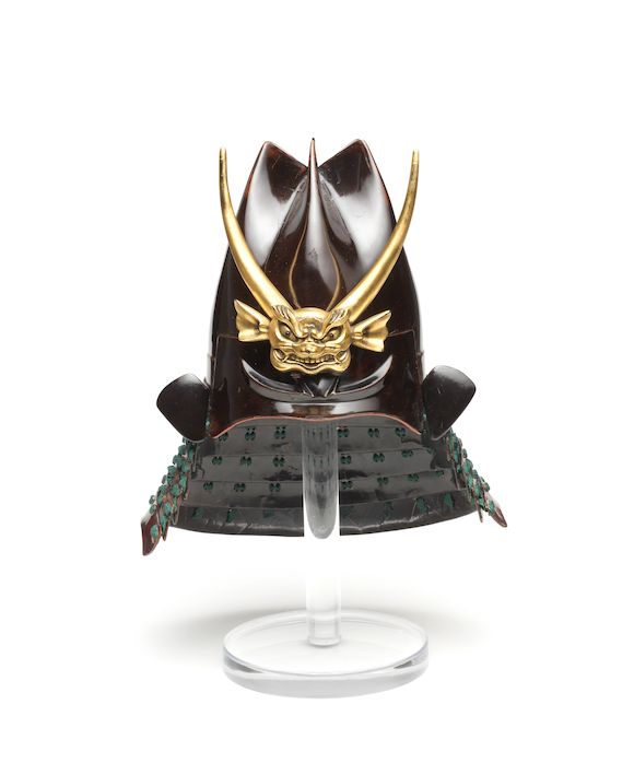 Bonhams : A black lacquer kawari kabuto (Eccentrically shaped helmet ...