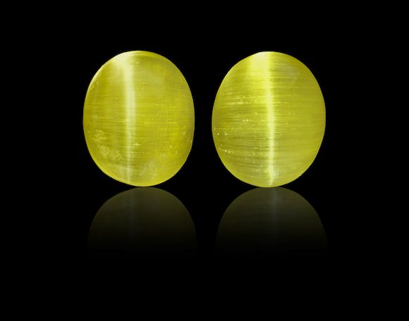 Bonhams : Pair of Yellow Beryl Cat's Eye Cabochons