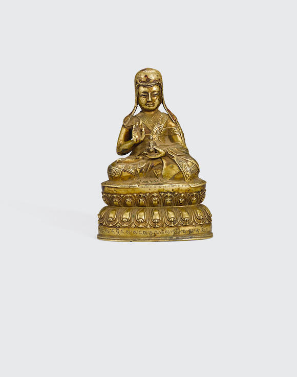 Bonhams A Copper Inlaid Gilt Copper Alloy Figure Of A Lama Tibet