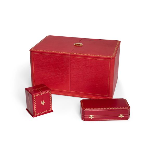 Bonhams : A Group of Three Cartier Tooled Red Leather Boxes (3)