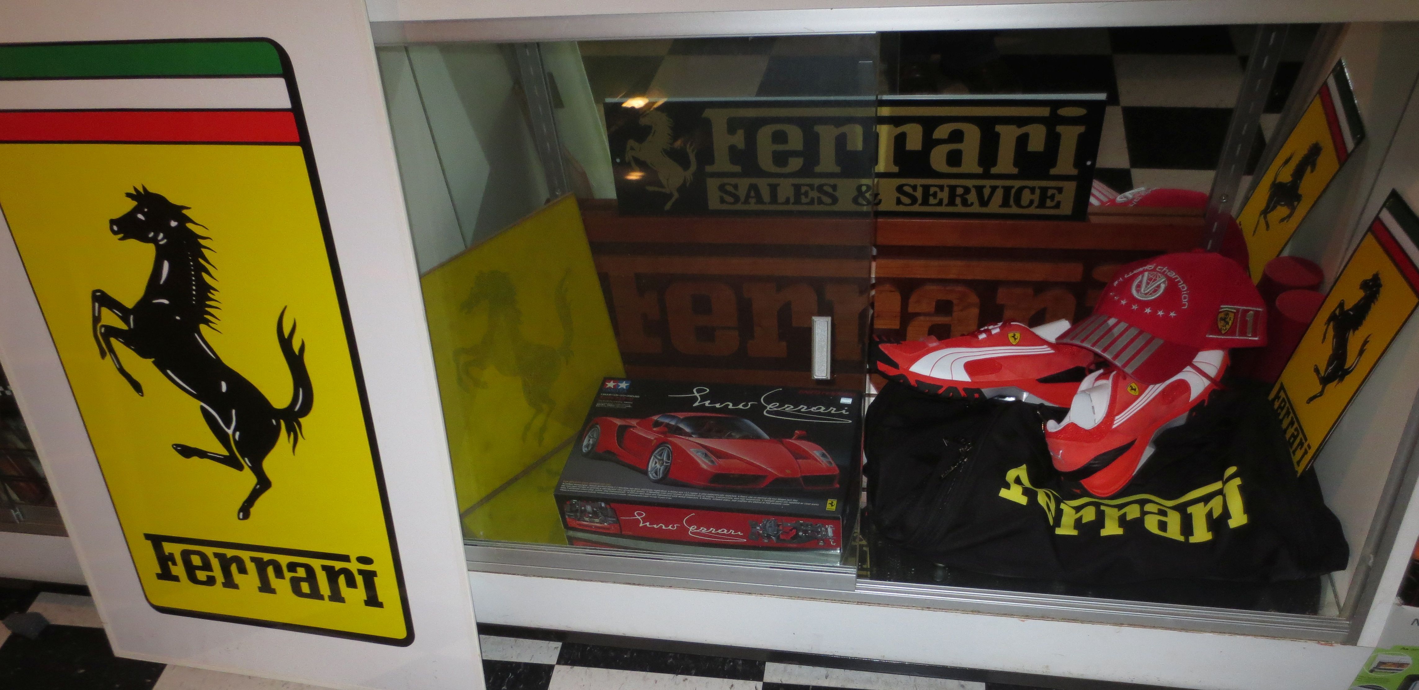 Bonhams Cars : Ferrari signs and collectibles,