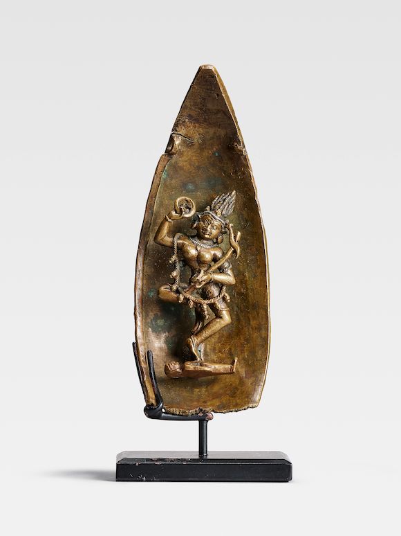 Bonhams : A SILVER INLAID BRASS FIGURE OF CHANDALI FROM A HEVAJRA LOTUS ...