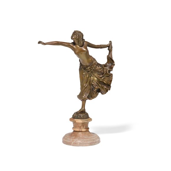 Bonhams : A PATINATED BRONZE FIGURE OF AN EGYPTIAN DANCER After a model ...