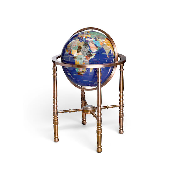 Bonhams : Multi-gemstone inlaid globe on copper toned stand