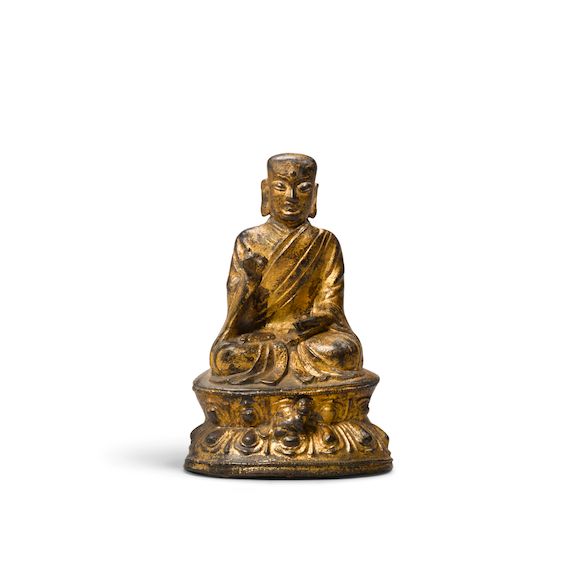 Bonhams : A gilt lacquered bronze seated figure of a luohan 16th/17th ...