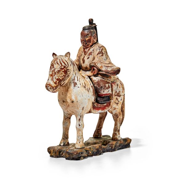 Bonhams : A small wood Shinto figure of a horse and rider Edo period ...