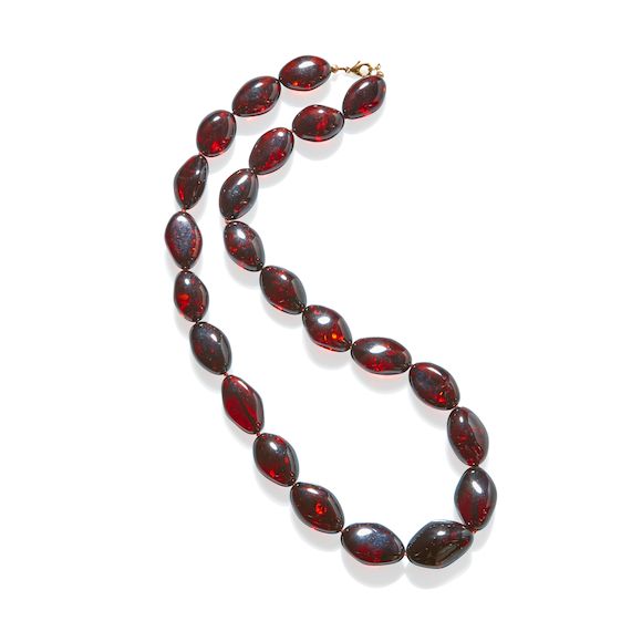Bonhams : Reddish Brown Amber Bead Necklace