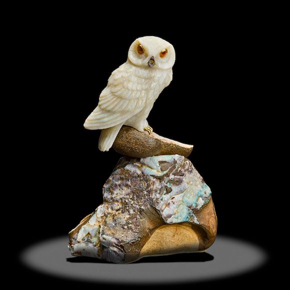 Bonhams : Carved White Opal Owl on a Boulder Opal Base by Manfred Wild