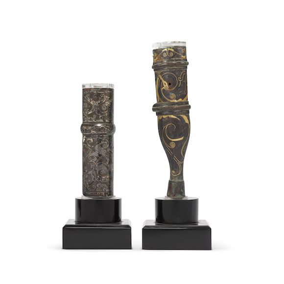 Bonhams : TWO GOLD AND SILVER INLAID BRONZE FERRULES Warring States