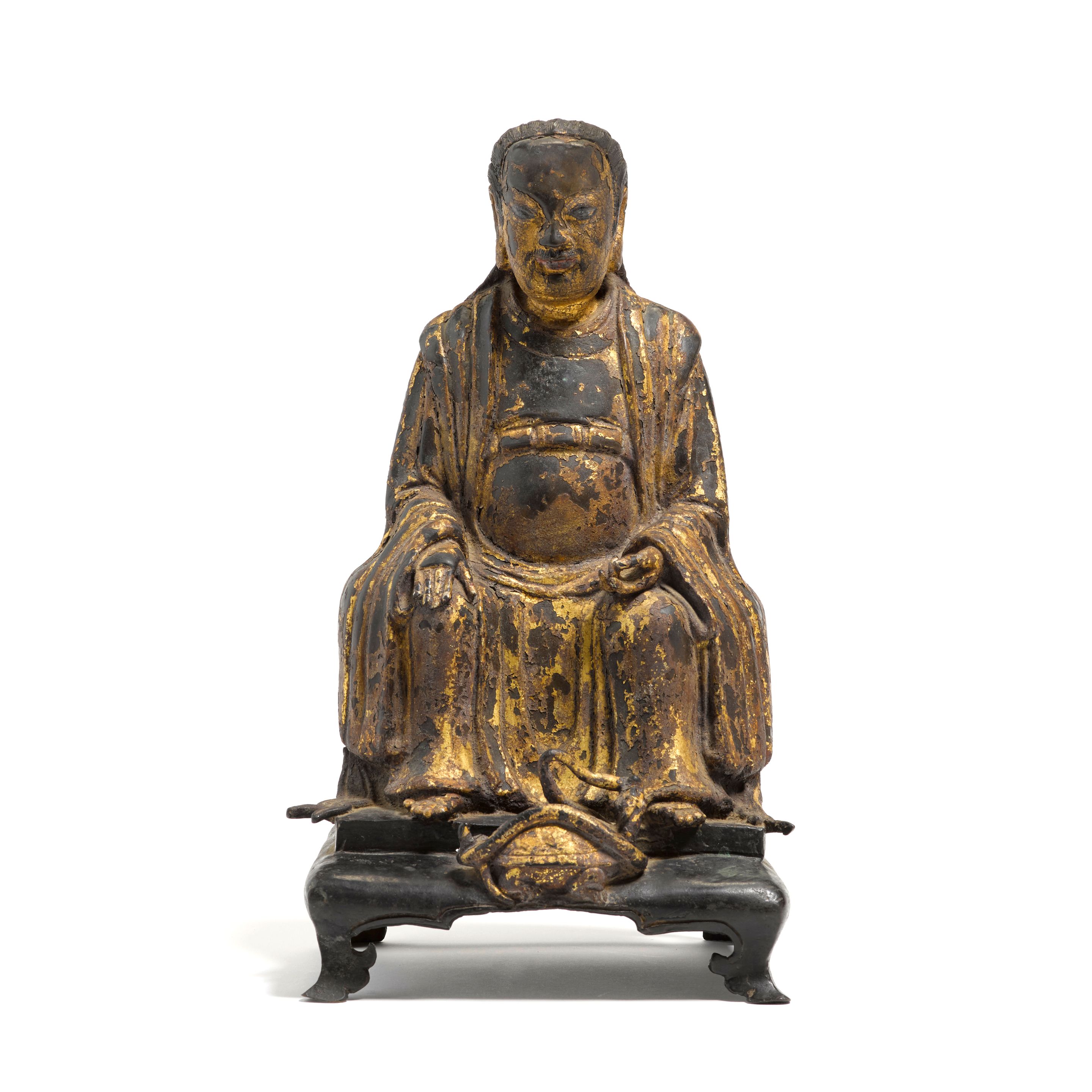 Bonhams : A CAST GILT-LACQUERED BRONZE FIGURE OF ZHENWU 17TH century