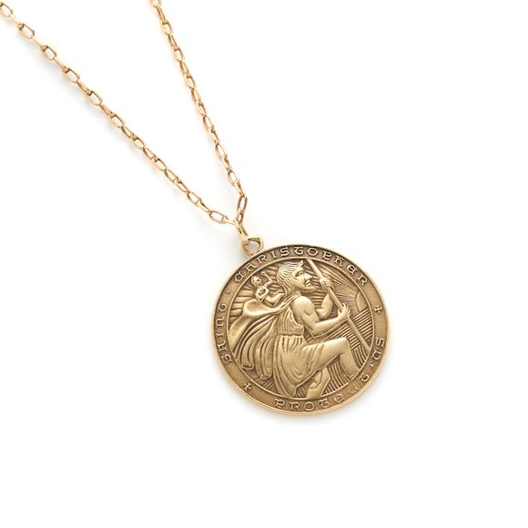 Bonhams : An Elvis Presley Saint Christopher medal worn in Jailhouse Rock