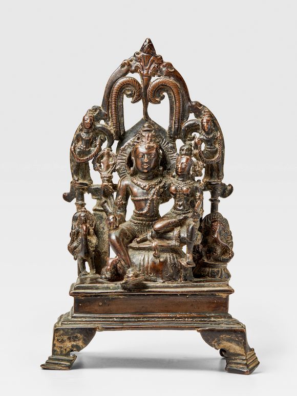 Bonhams : A COPPER ALLOY SHRINE TO UMA MAHESHVARA KARNATAKA, WESTERN ...