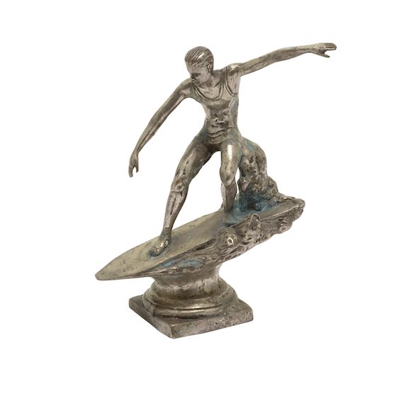 Bonhams : A vintage Surfing sculpture Cast white metal, featuring a ...