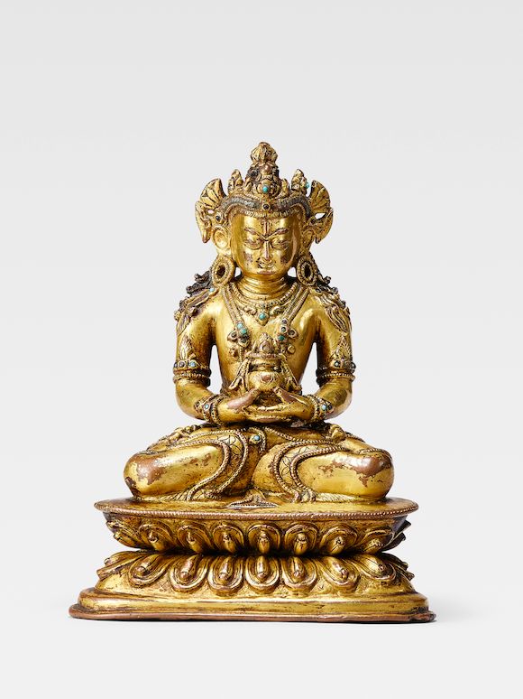 Bonhams : A SILVER INLAID GILT COPPER ALLOY FIGURE OF AMITAYUS NEPAL ...