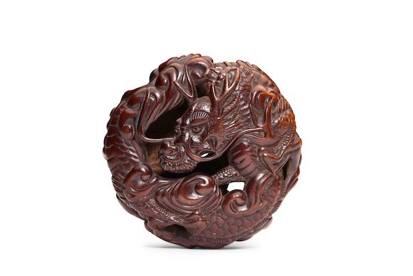 Bonhams : A group of five wood netsuke, five fruit-nut netsuke, and an ...