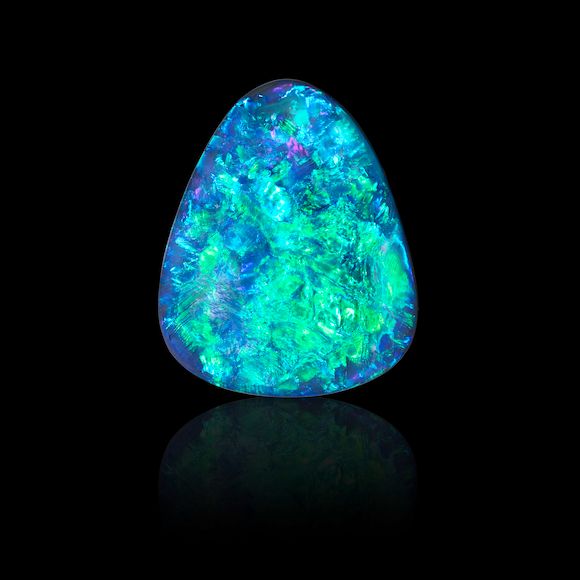 Bonhams : Stunning Double-sided Black "Nobby" Opal with Blue-Green Fire