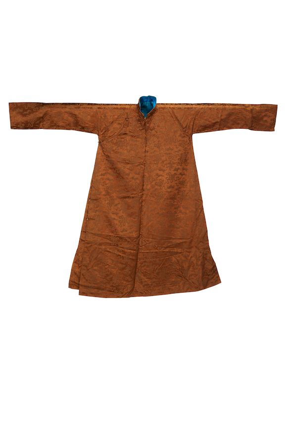 Bonhams : A TIBETAN TOBACCO brown silk damask robe, Chuba 19th Century