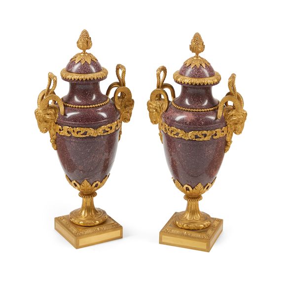 Bonhams : A pair of Louis XVI style gilt bronze mounted porphyry urns