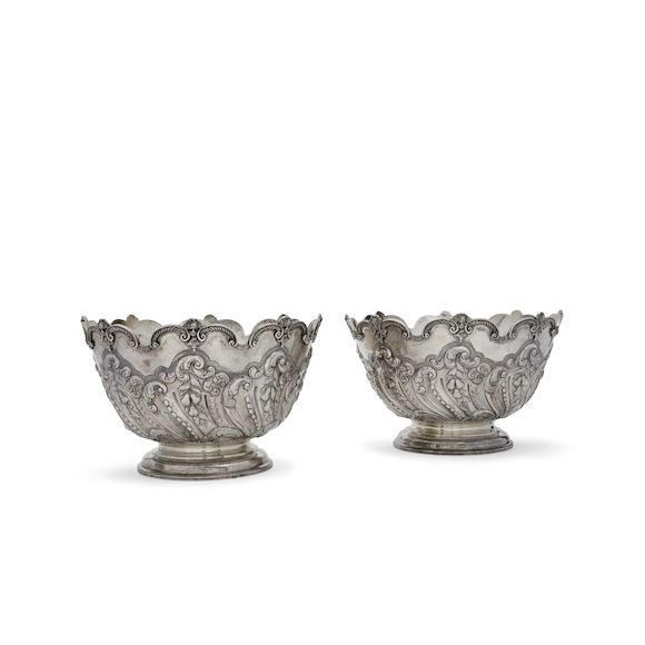 Bonhams : A PAIR OF ENGLISH SILVER MONTEITHS with spurious 18th century ...