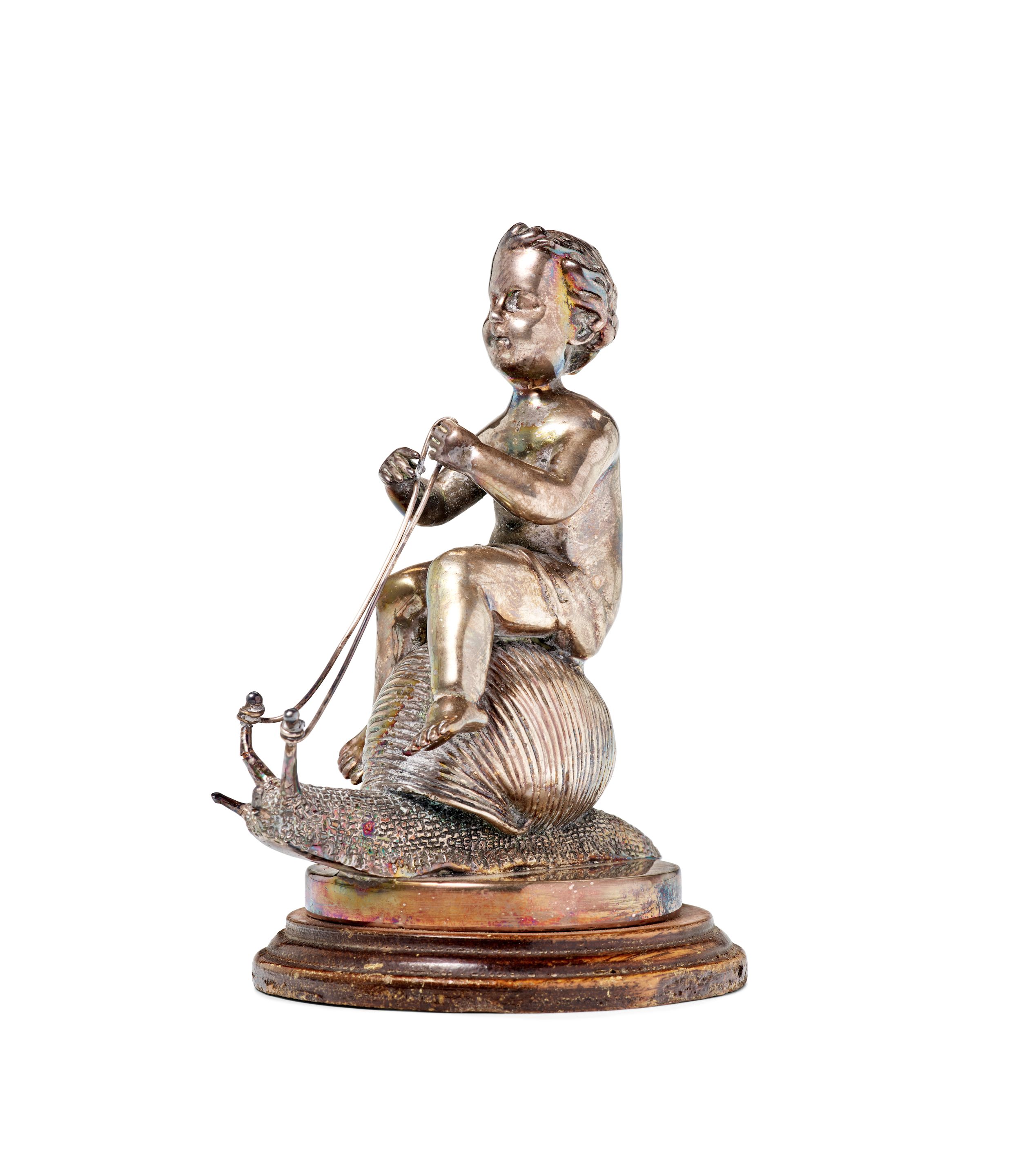 Bonhams Cars : A Snail Rider mascot, French, circa 1910,