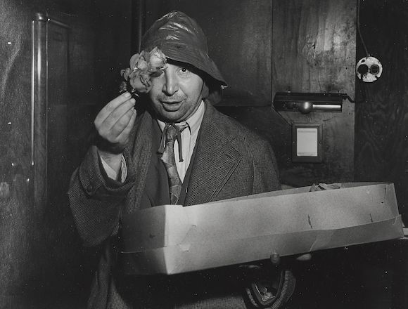 Bonhams : Weegee (Arthur Fellig) (1899-1968); The Flower Peddler;